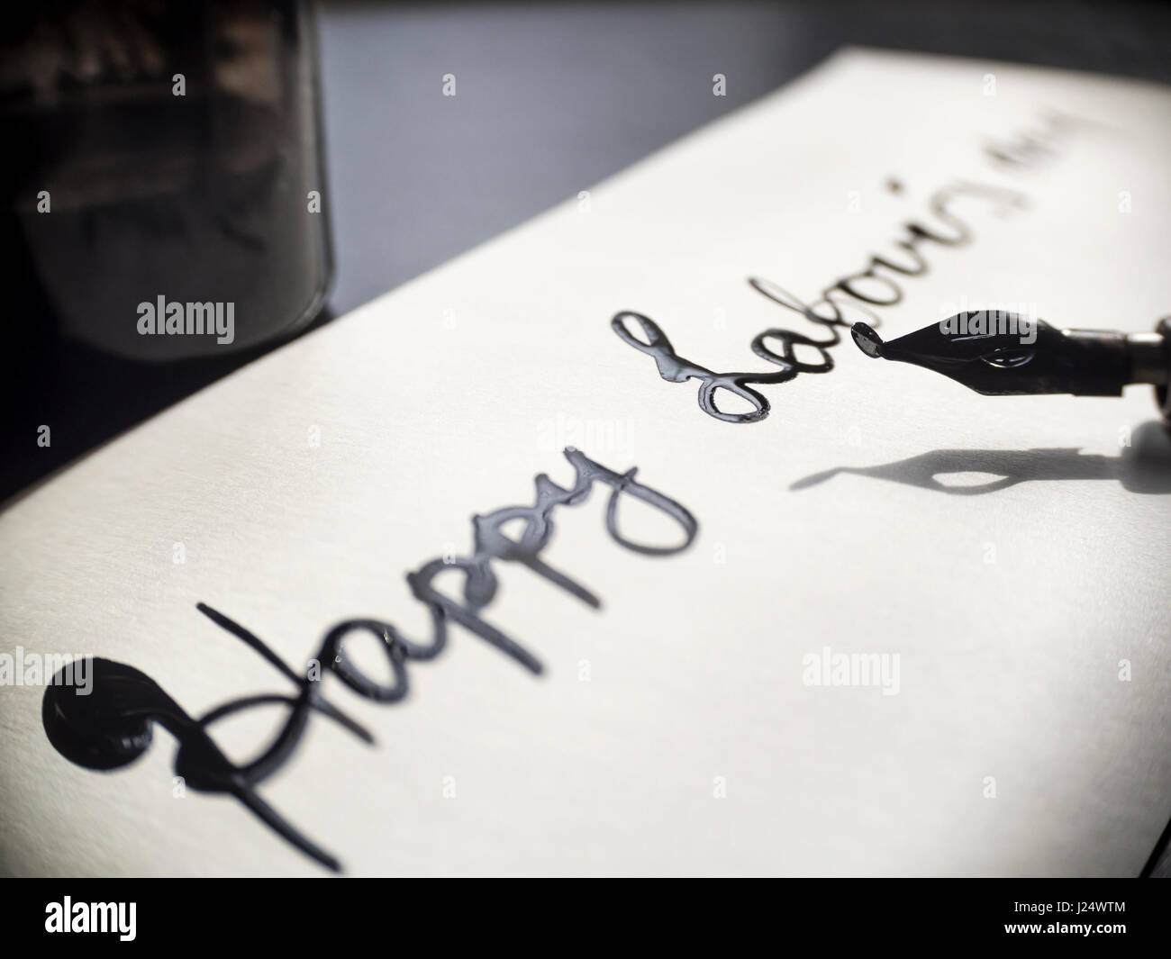 Happy labour's day calligraphy and lattering post card. Left view with ...