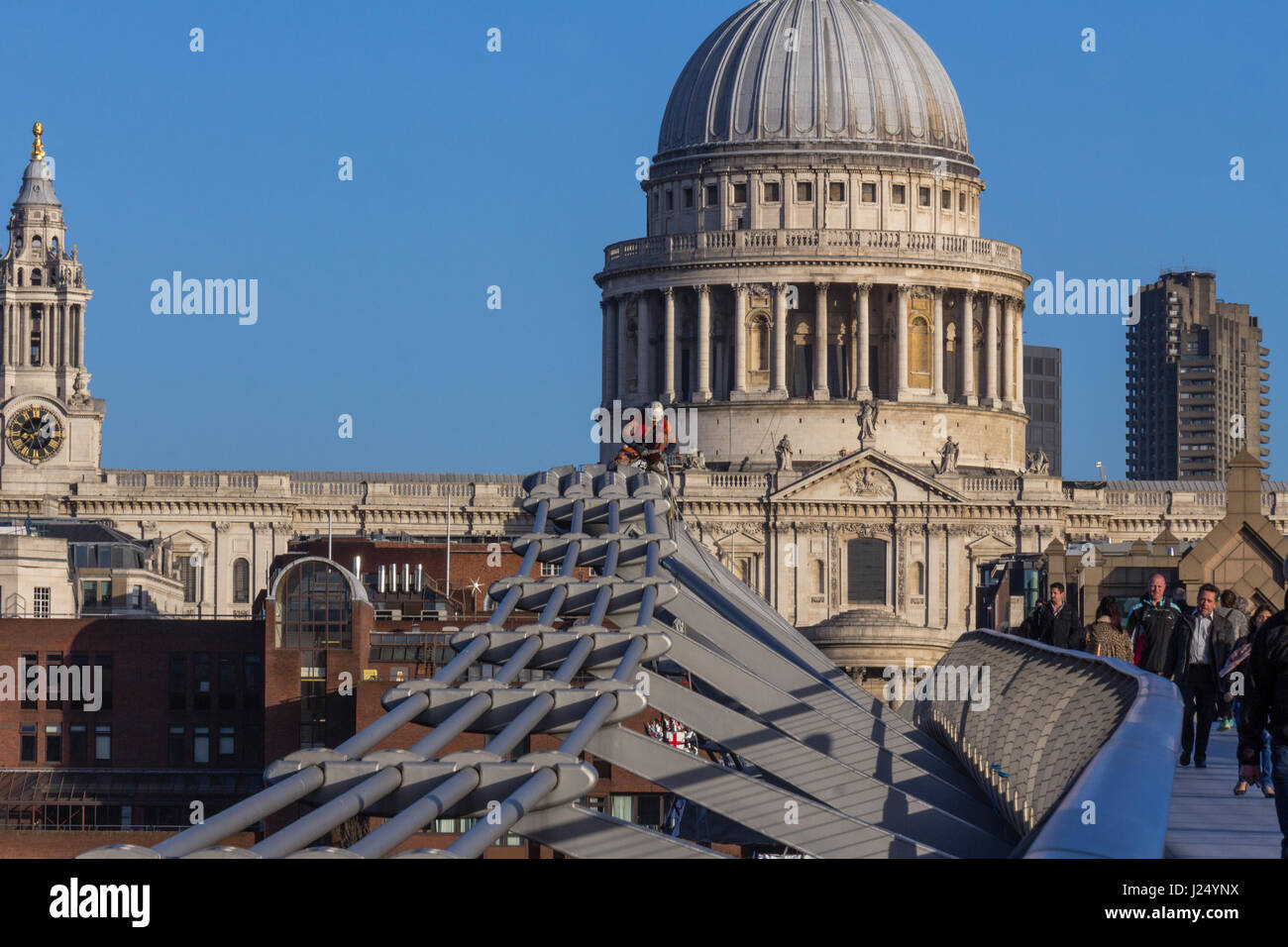 Bridge Engineer, wearing a safety harness, inspecting the Millennium ...