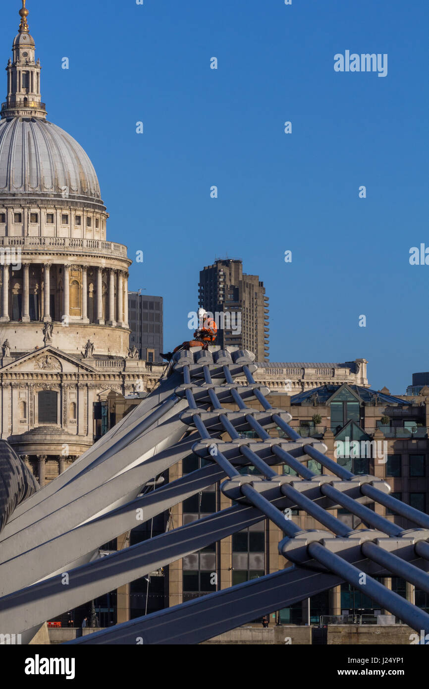 Bridge Engineer, wearing a safety harness, inspecting the Millennium ...