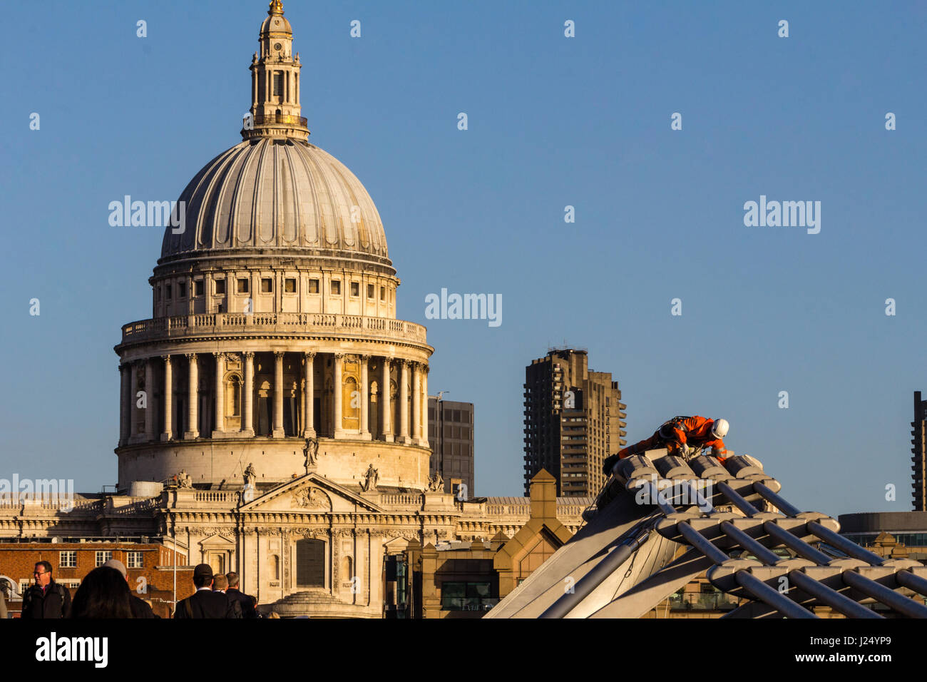 Bridge Engineer, wearing a safety harness, inspecting the Millennium ...