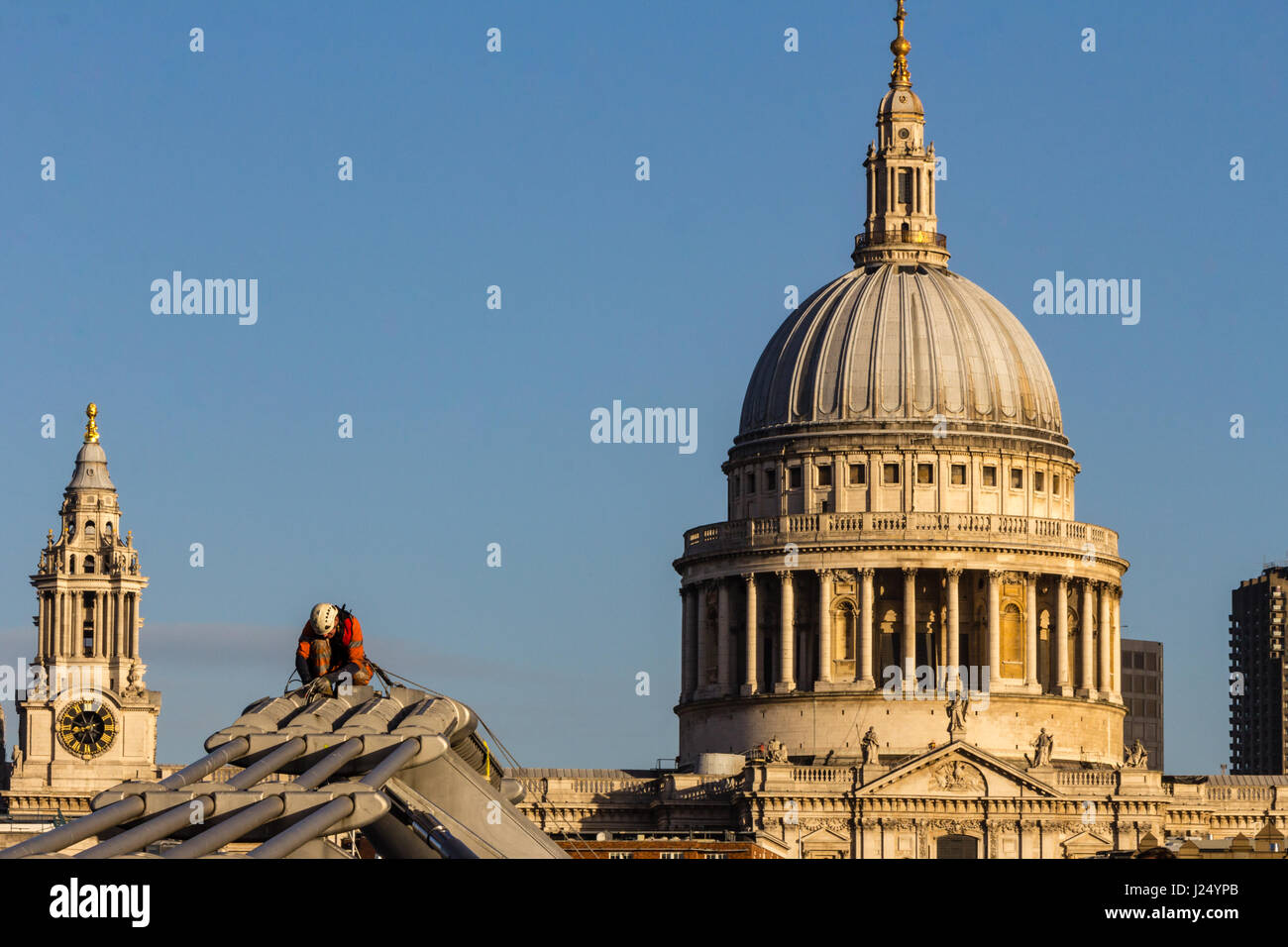 Bridge Engineer, wearing a safety harness, inspecting the Millennium ...