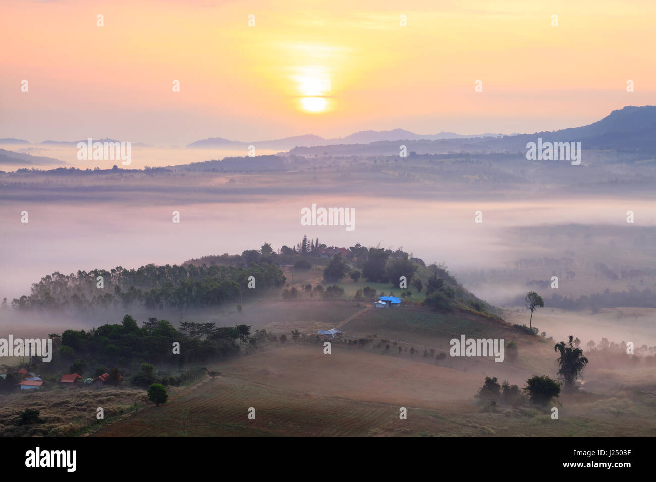 Misty morning sunrise in Khao Takhian Ngo View Point at Khao-kho ...