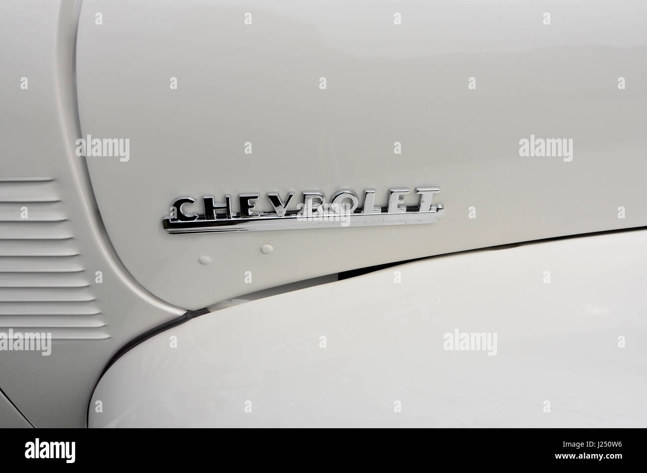 white vintage Chevrolet close up showing name badge Stock Photo - Alamy