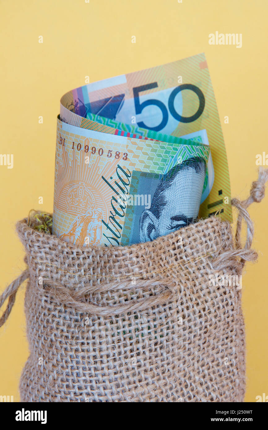 Australian dollars in a hessian bag Stock Photo - Alamy