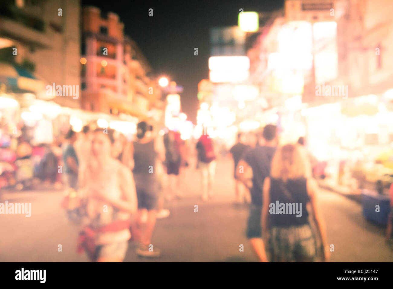 Blurred image of busy night life in the city. Defocused photo of night ...
