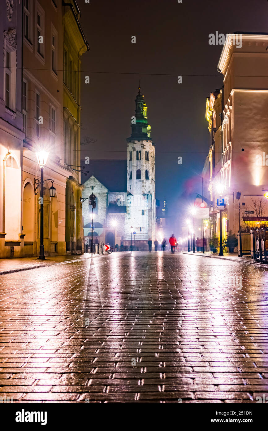 Night street in the Krakow, Poland. Colorful night illumination ...