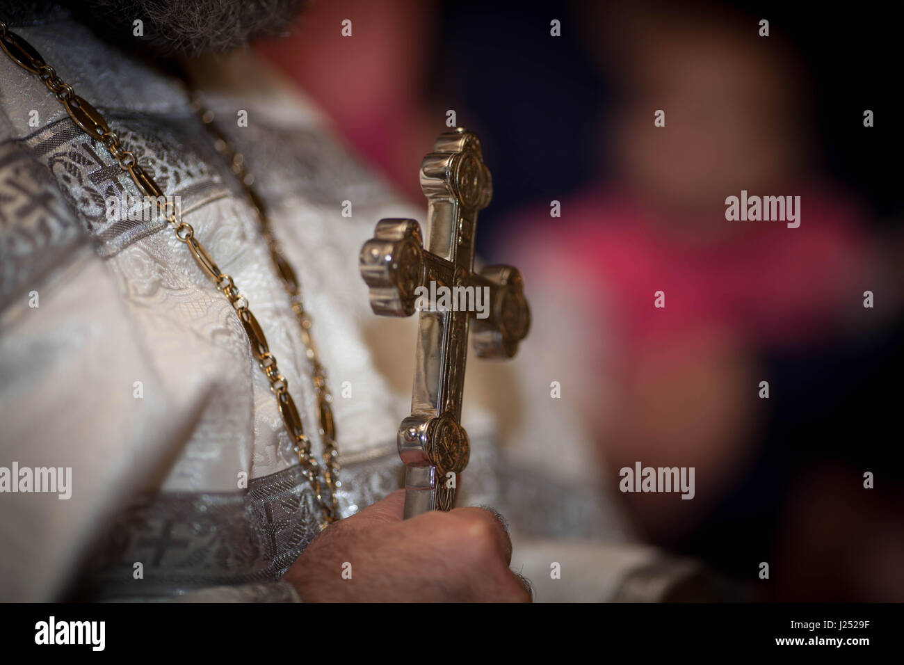 a priest holds a cross Stock Photo - Alamy