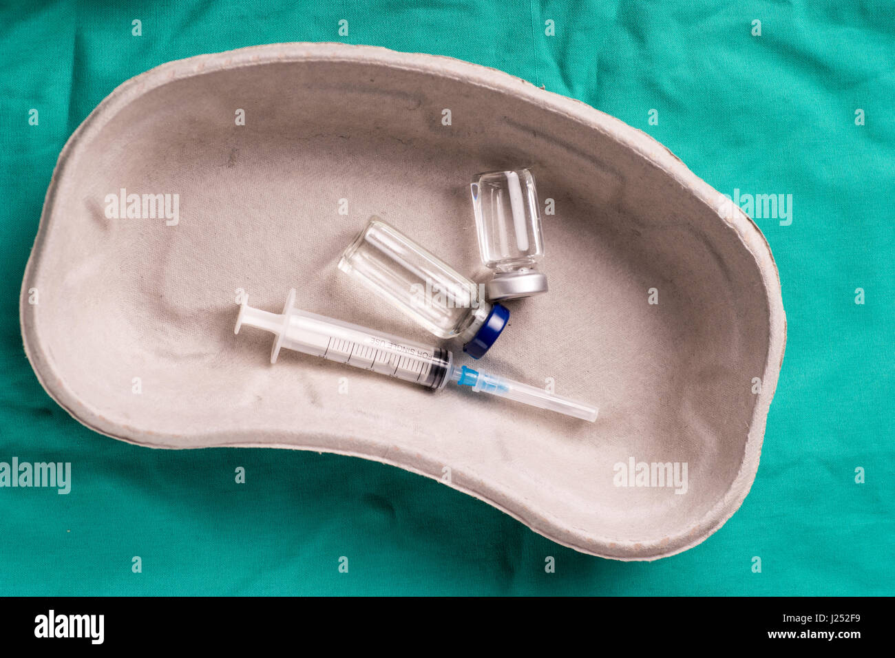 Medical syringe in nurses hi-res stock photography and images - Alamy