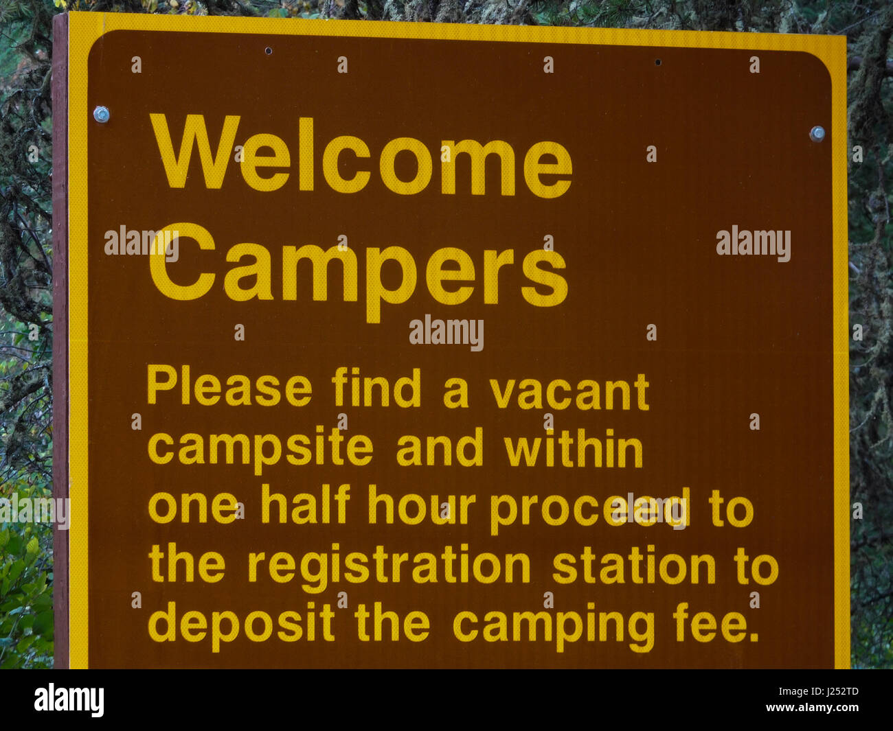 Campers Welcome Sign with Registration Rules Stock Photo - Alamy