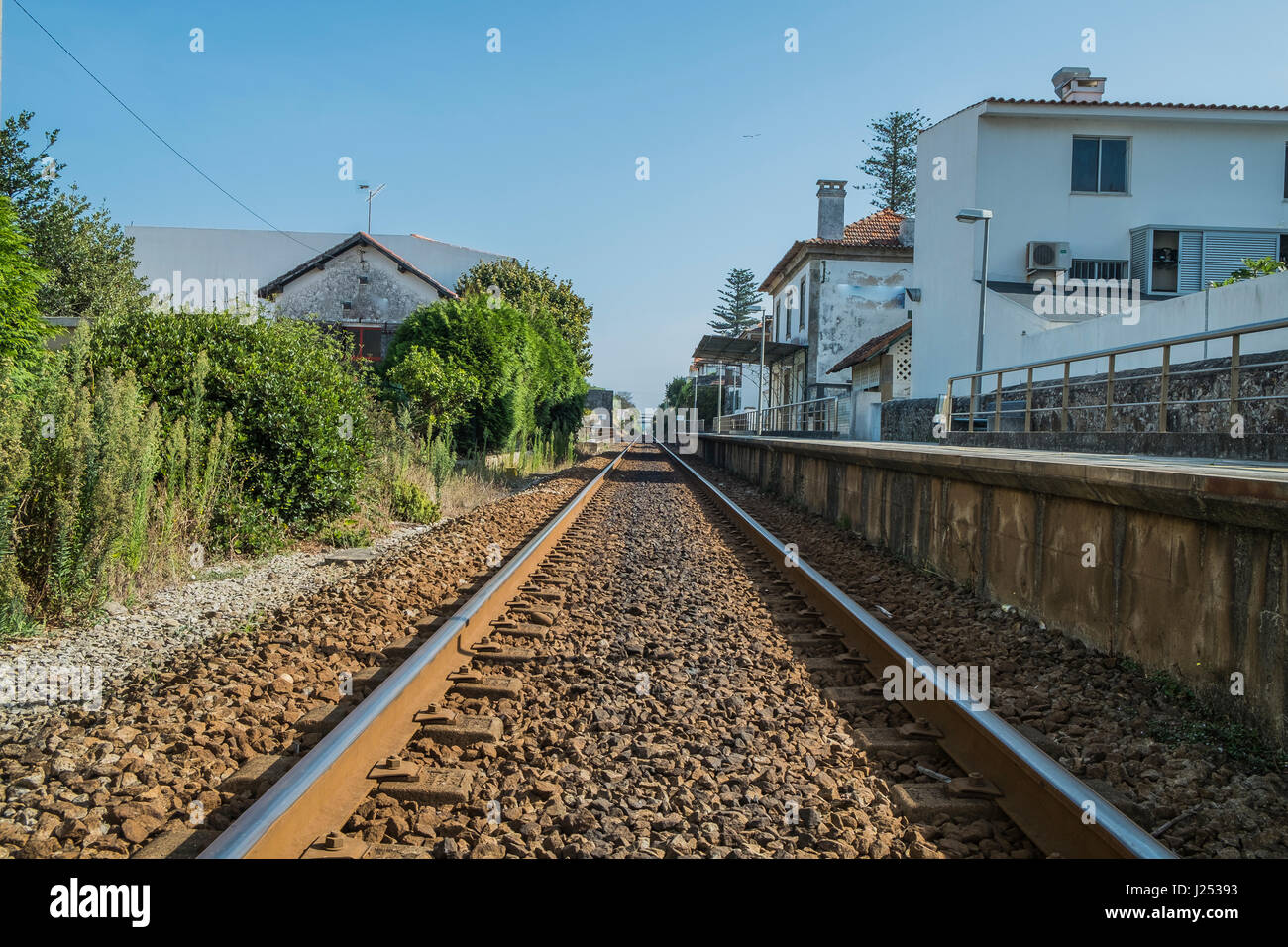 Train tracks in an old station in the north of portugal Stock Photo - Alamy