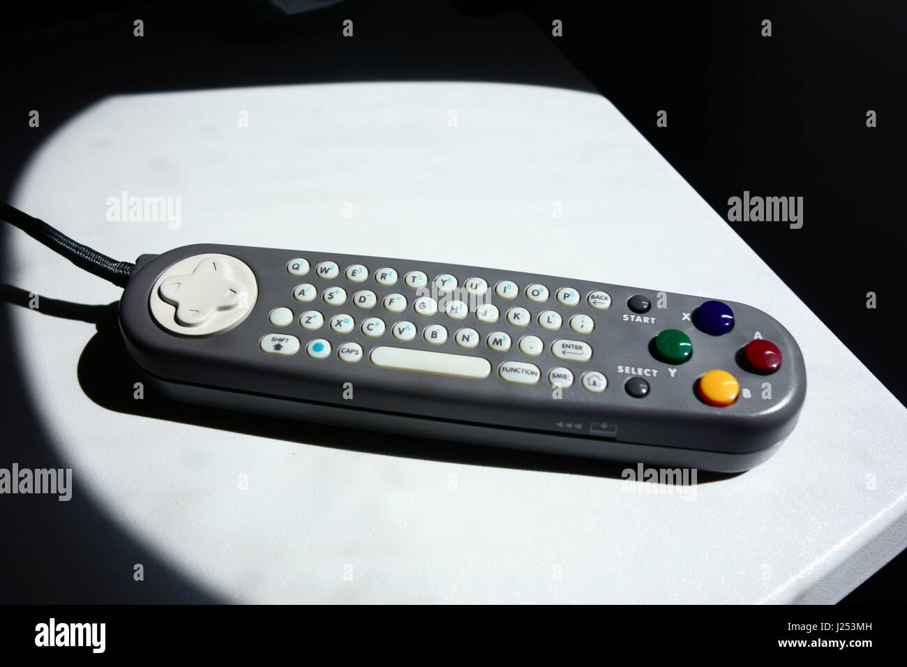 In-flight eentertainment remote control Stock Photo - Alamy
