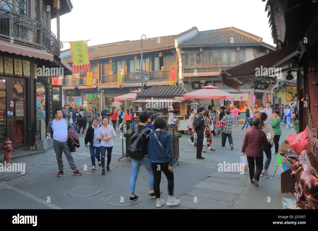 People visit Qing He Fang historical street in Hangzhou China. Qing He ...