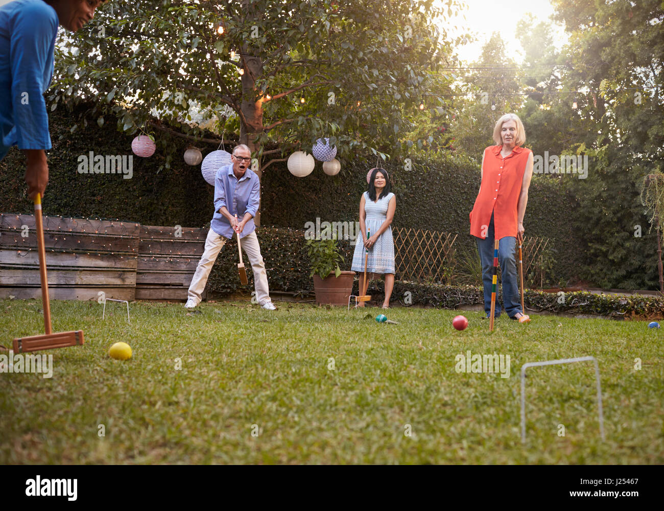 Friends playing croquet hi-res stock photography and images - Alamy