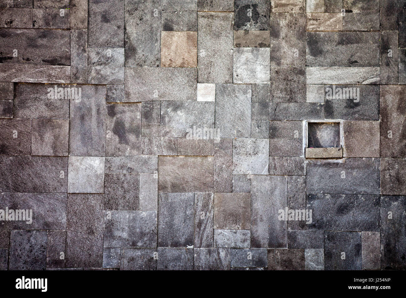 Wall made of stone in the mosaic Stock Photo - Alamy