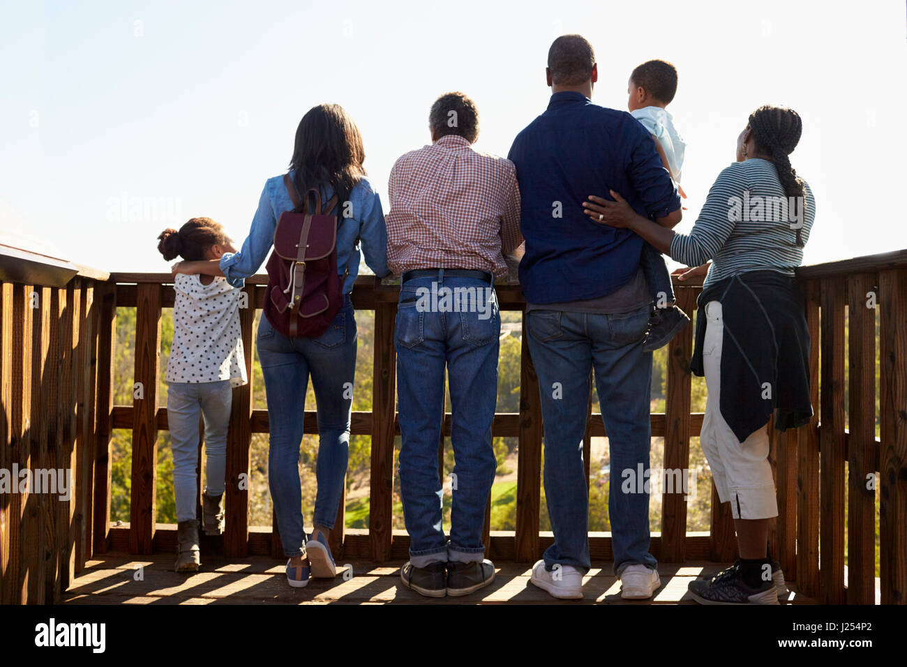 Multi Generation Family Standing On Outdoor Observation Deck Stock ...