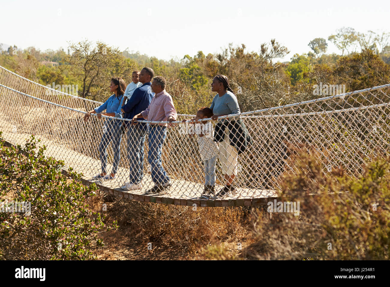 Child crossing bridge hi-res stock photography and images - Alamy