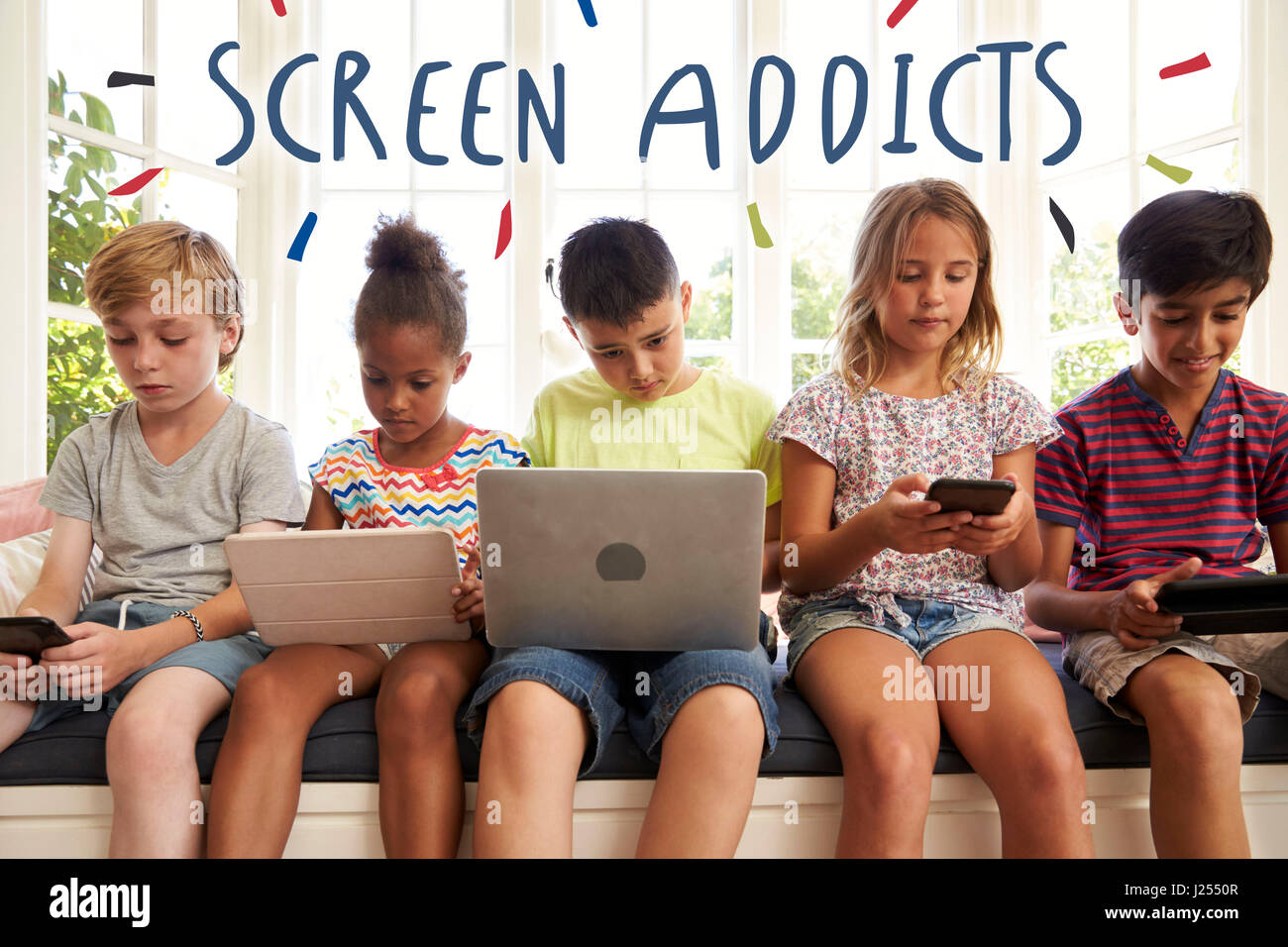 Screen Addict Children Using Technology Stock Photo - Alamy
