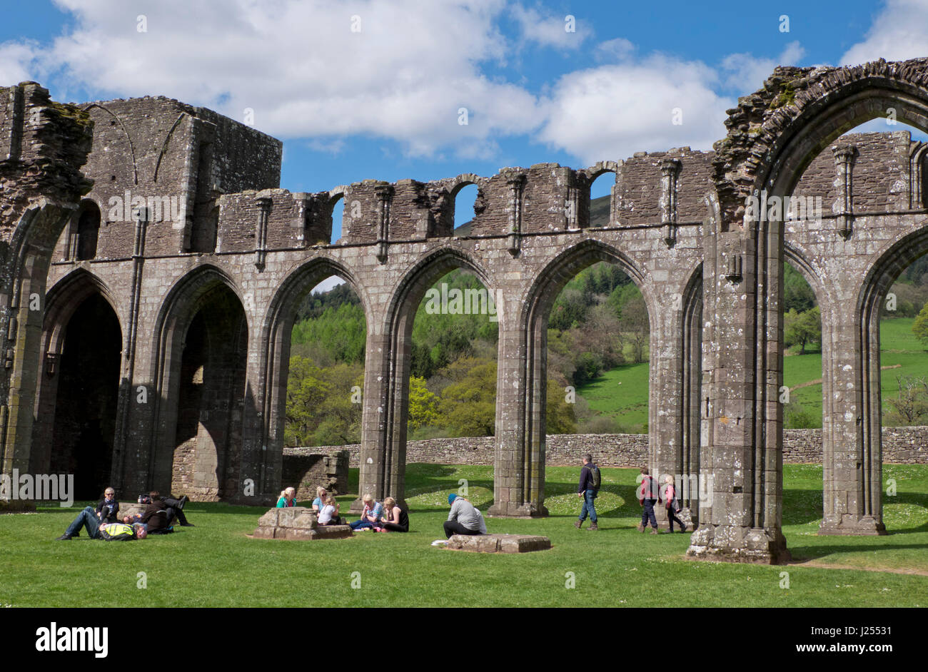 Visitors at the site of medieval Llanthony Abbey, of the Cistercian ...