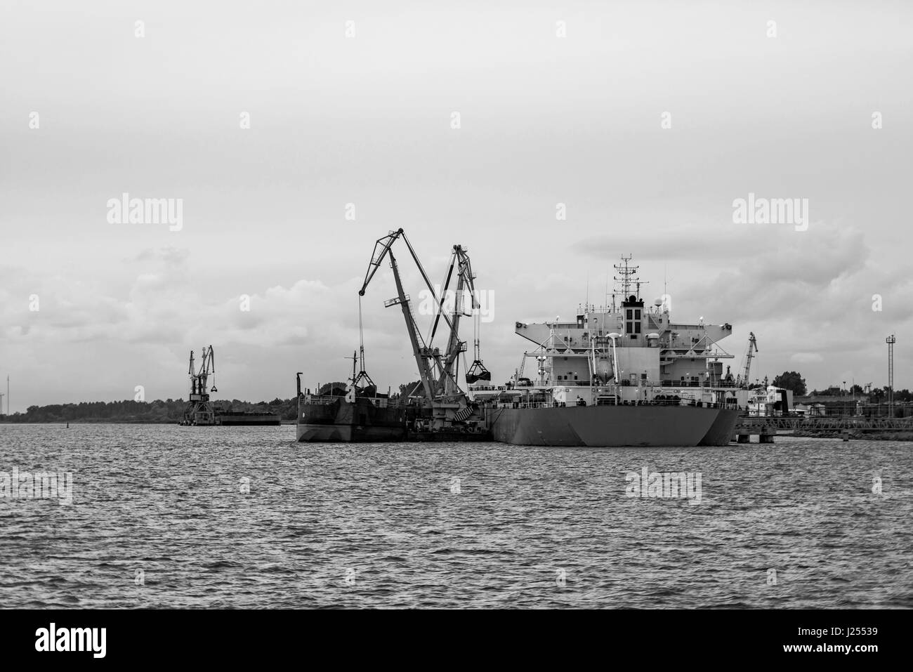 Ship transshipment of the port channel Stock Photo - Alamy