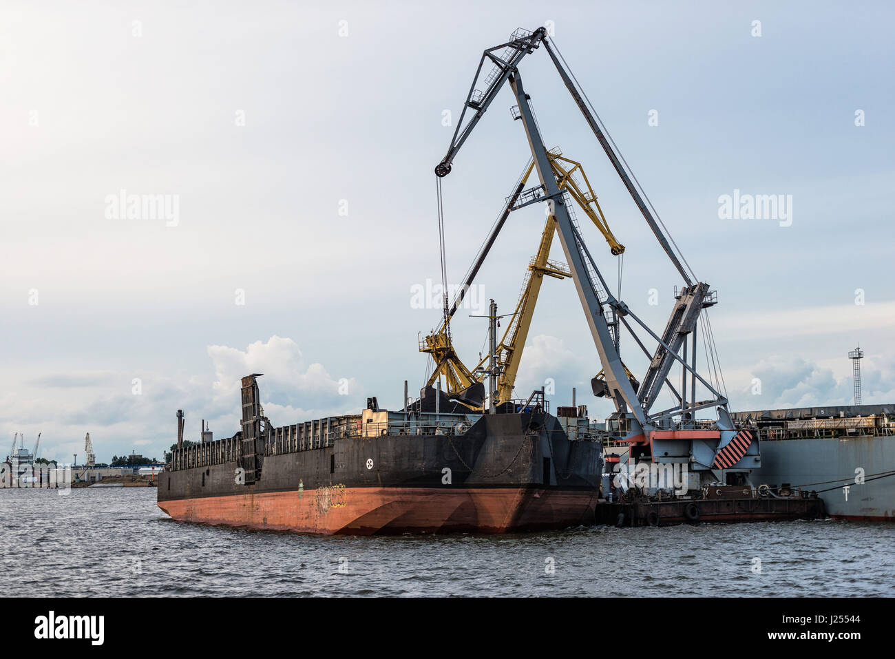 Ship transshipment of the port channel Stock Photo - Alamy