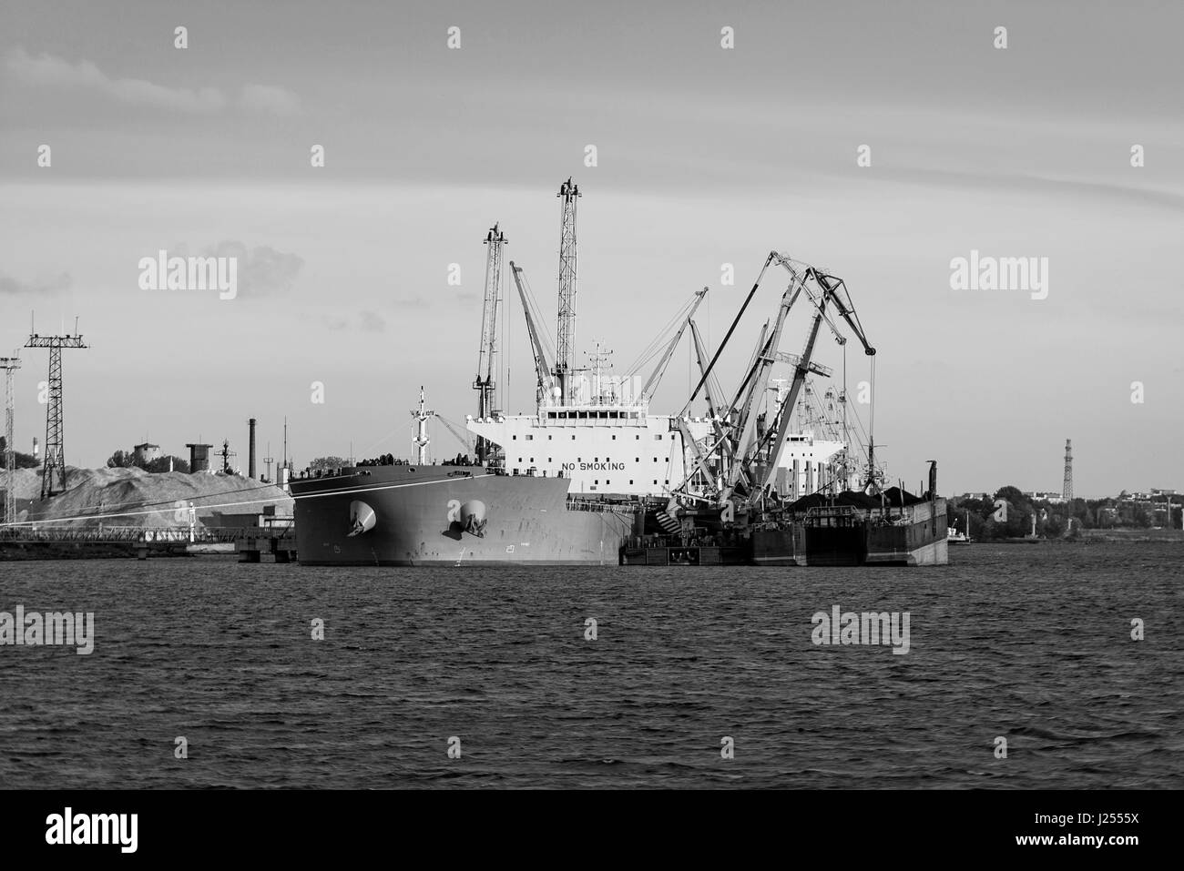 Ship transshipment of the port channel Stock Photo - Alamy