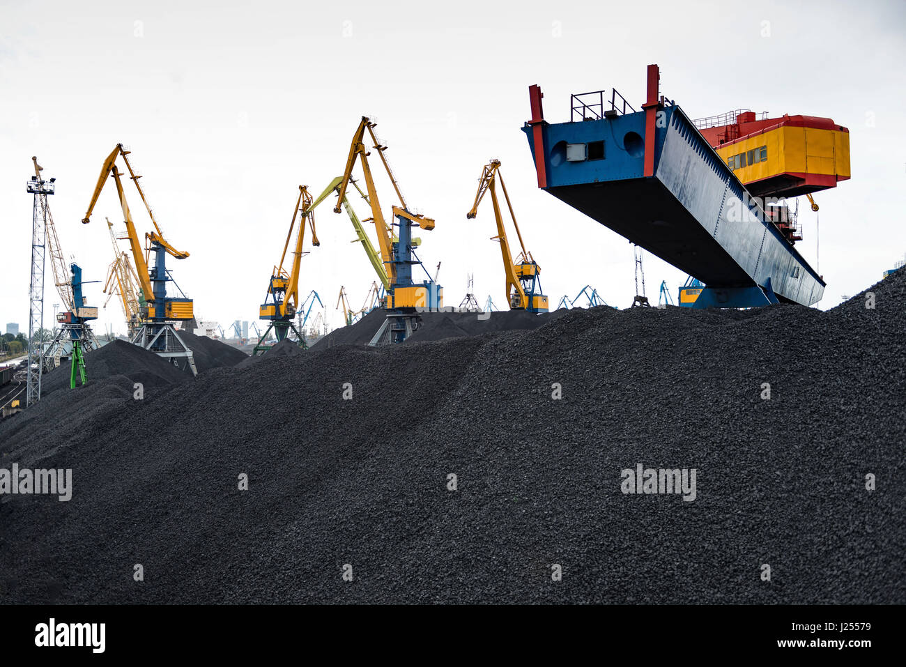 Work in port coal transshipment terminal Stock Photo - Alamy