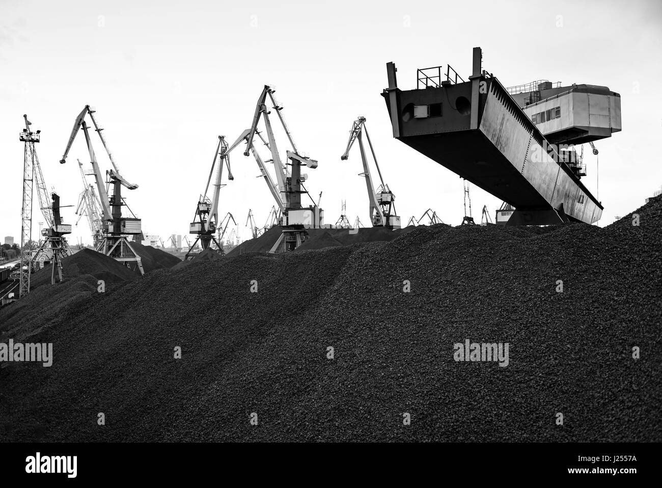 Work in port coal transshipment terminal Stock Photo - Alamy