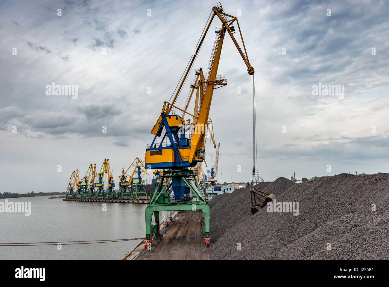 Work in port coal handling terminal Stock Photo - Alamy