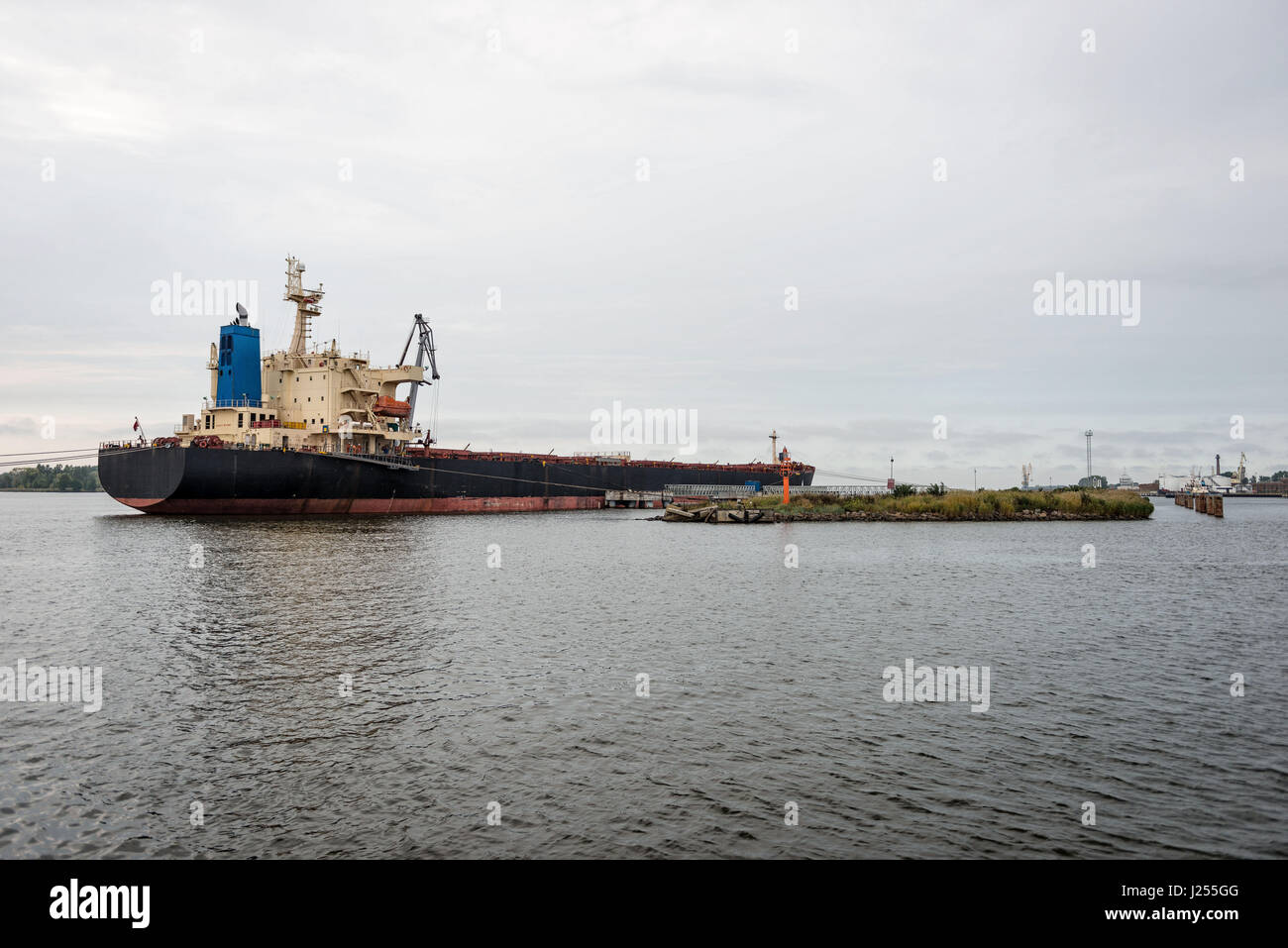 Ship transshipment of the port channel Stock Photo - Alamy