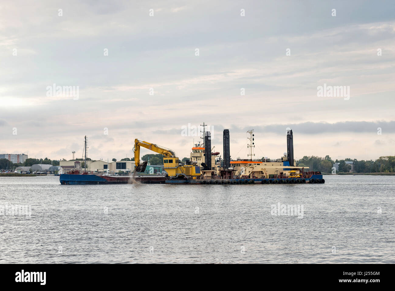 The port channel riverbed cleaning work Stock Photo - Alamy