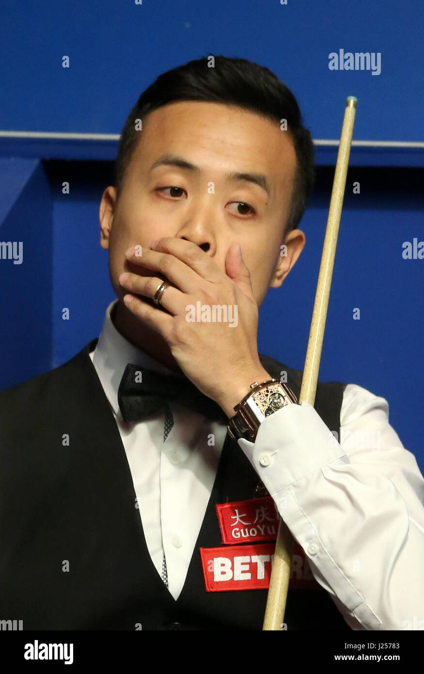 Marco Fu during his match against Neil Robertson on day Ten of the Betfred Snooker World ...