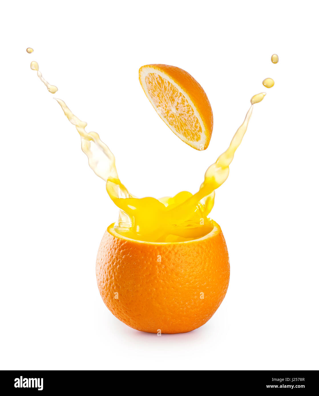Splash of orange juice in orange isolated on white background Stock ...