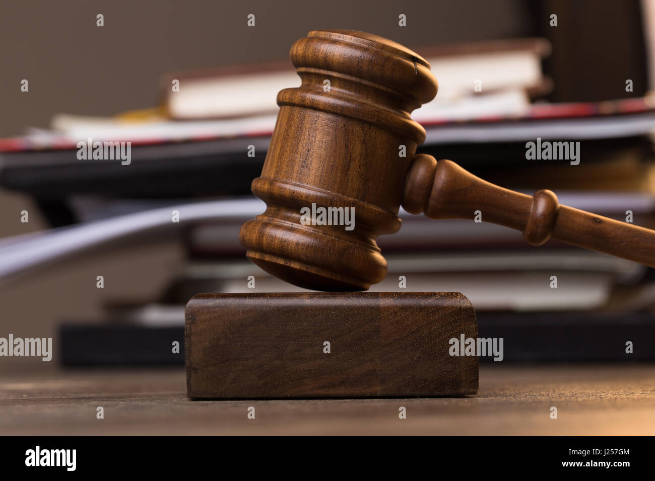 Folder, judge's hammer on table Stock Photo - Alamy