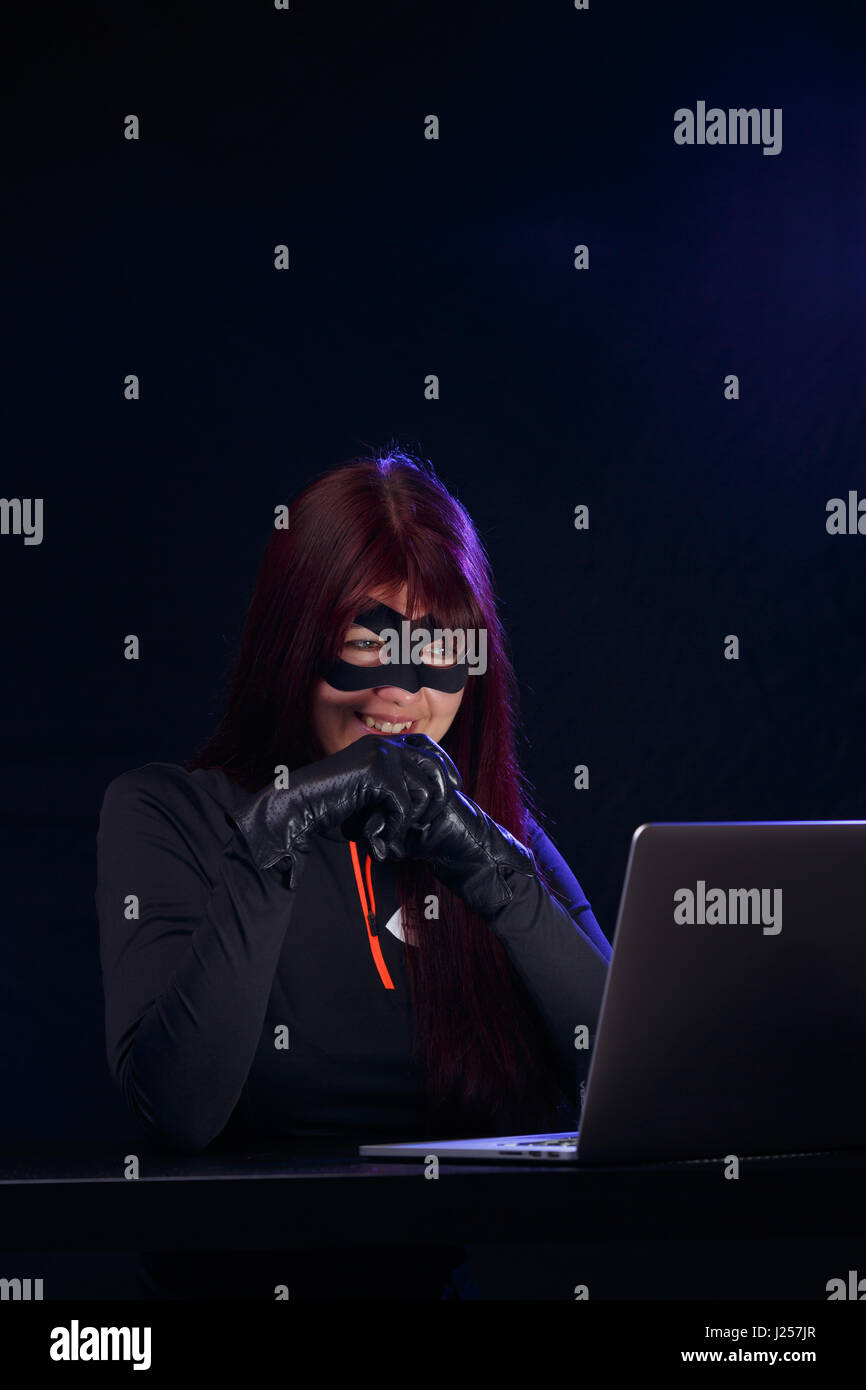 Night thief in black mask Stock Photo - Alamy