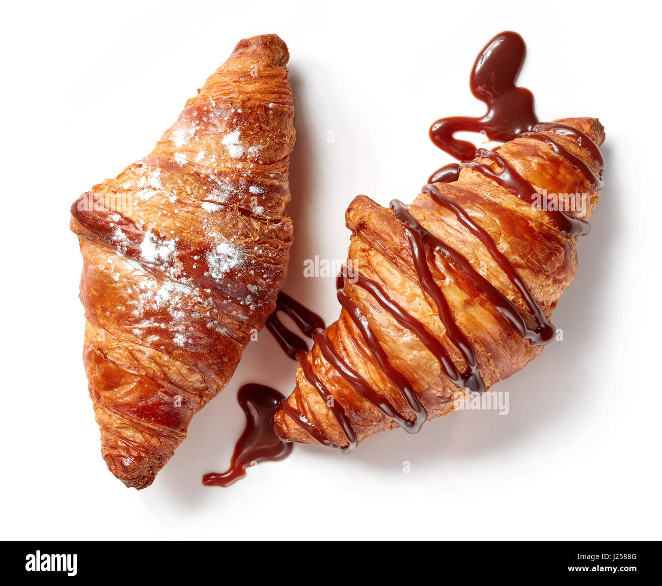 two sweet croissants isolated on white background, top view Stock Photo ...