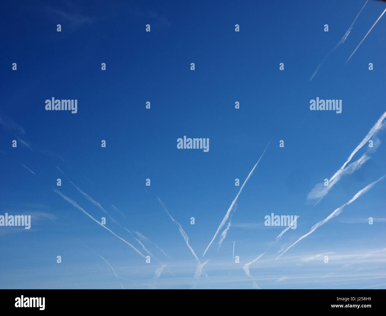 Persistent spreading contrail hi-res stock photography and images - Alamy