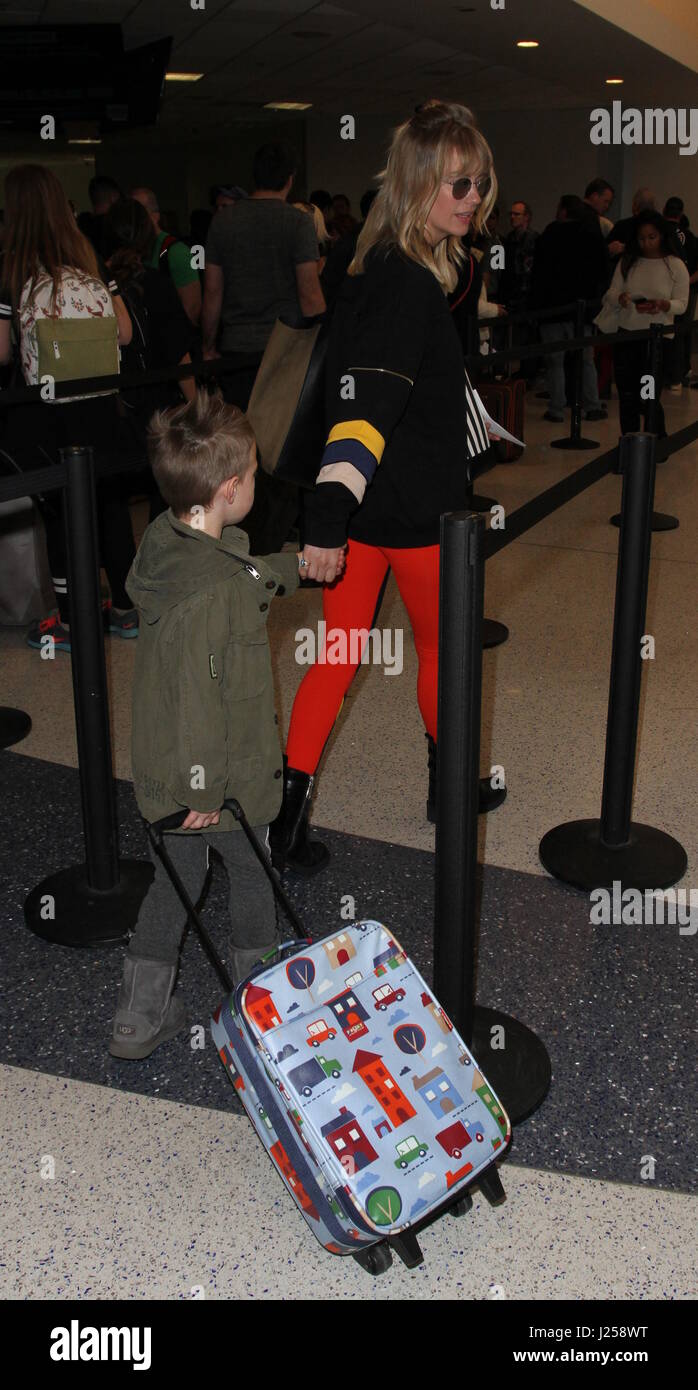 January Jones departs from the airport with her son Xander Dane Jones ...