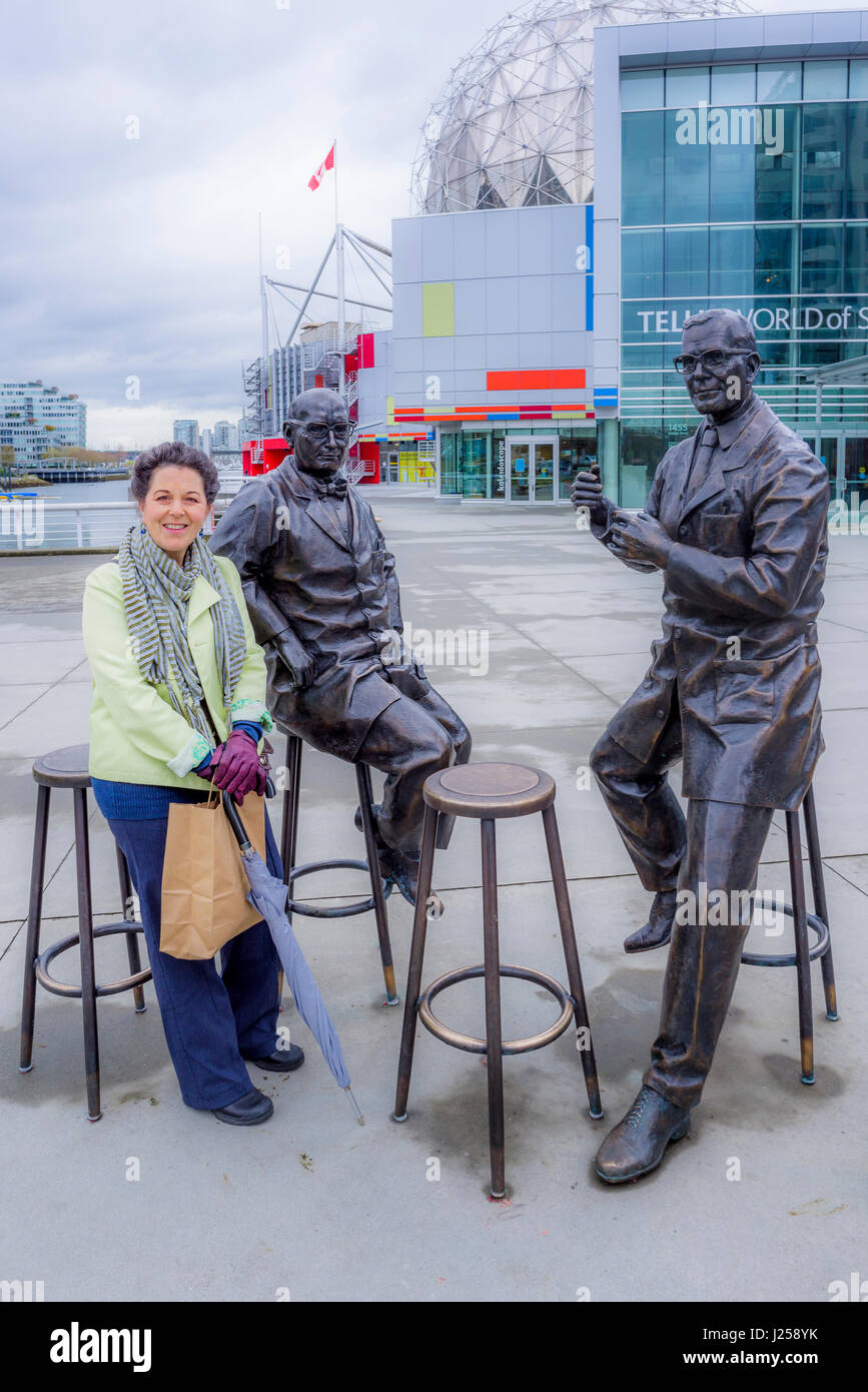 Sculptor Ruth Aberethy beside her portrait of Doctors James Till ...