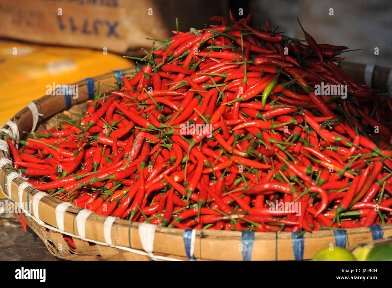 Sunlit Red Hot Chili Peppers for sale at an open air stand, Kandal ...