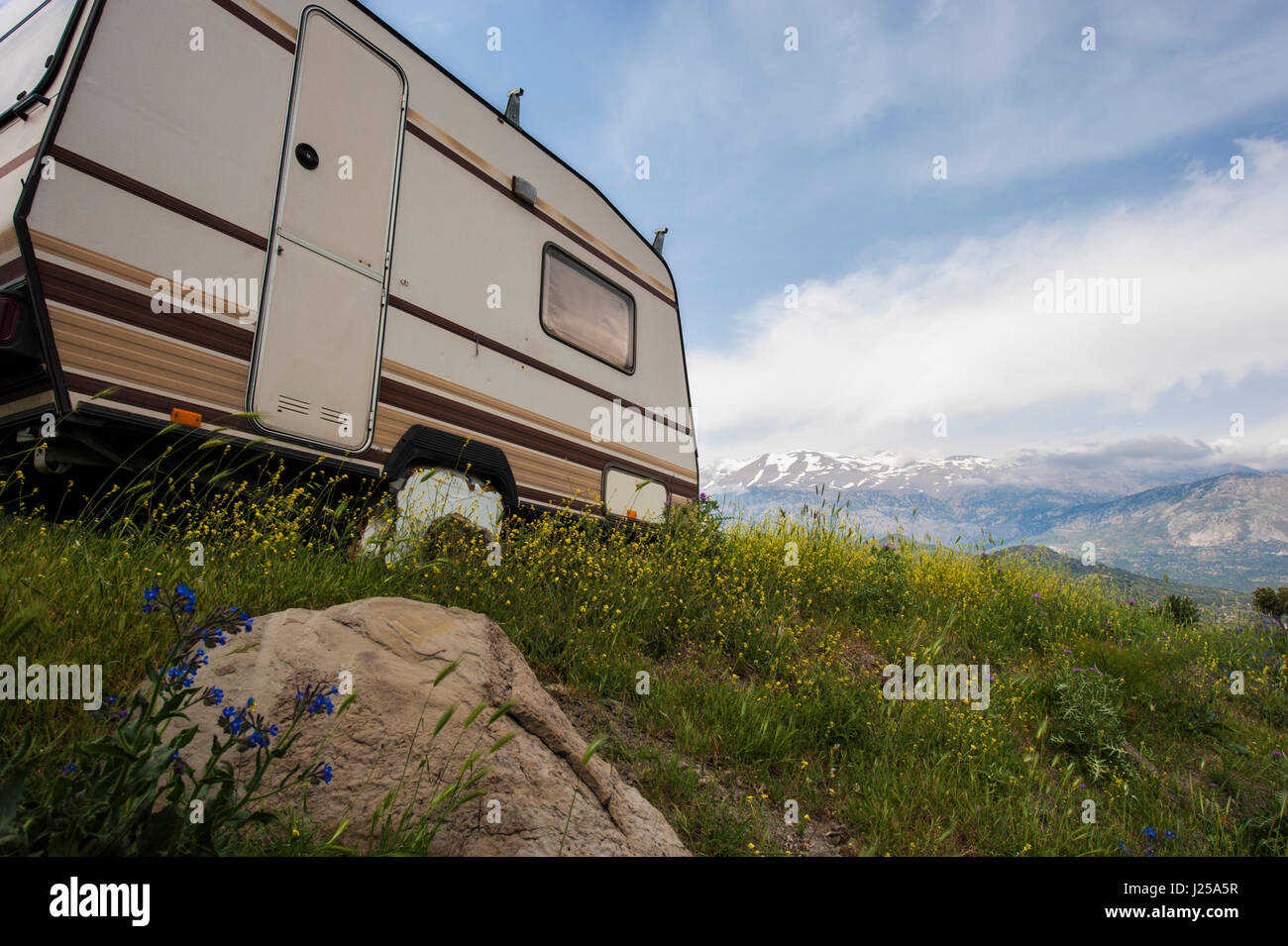 A camping trailer parked in the mountains of central Crete, Greece ...