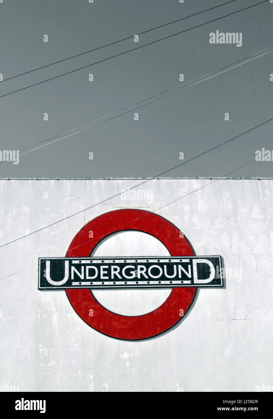 Underground sign on white wall Stock Photo - Alamy