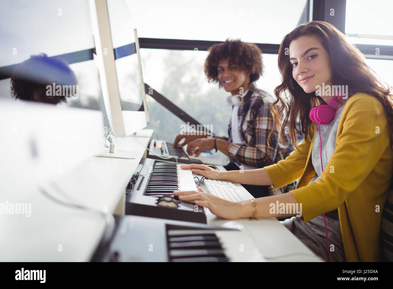 Two sound engineers working together in studio Stock Photo - Alamy