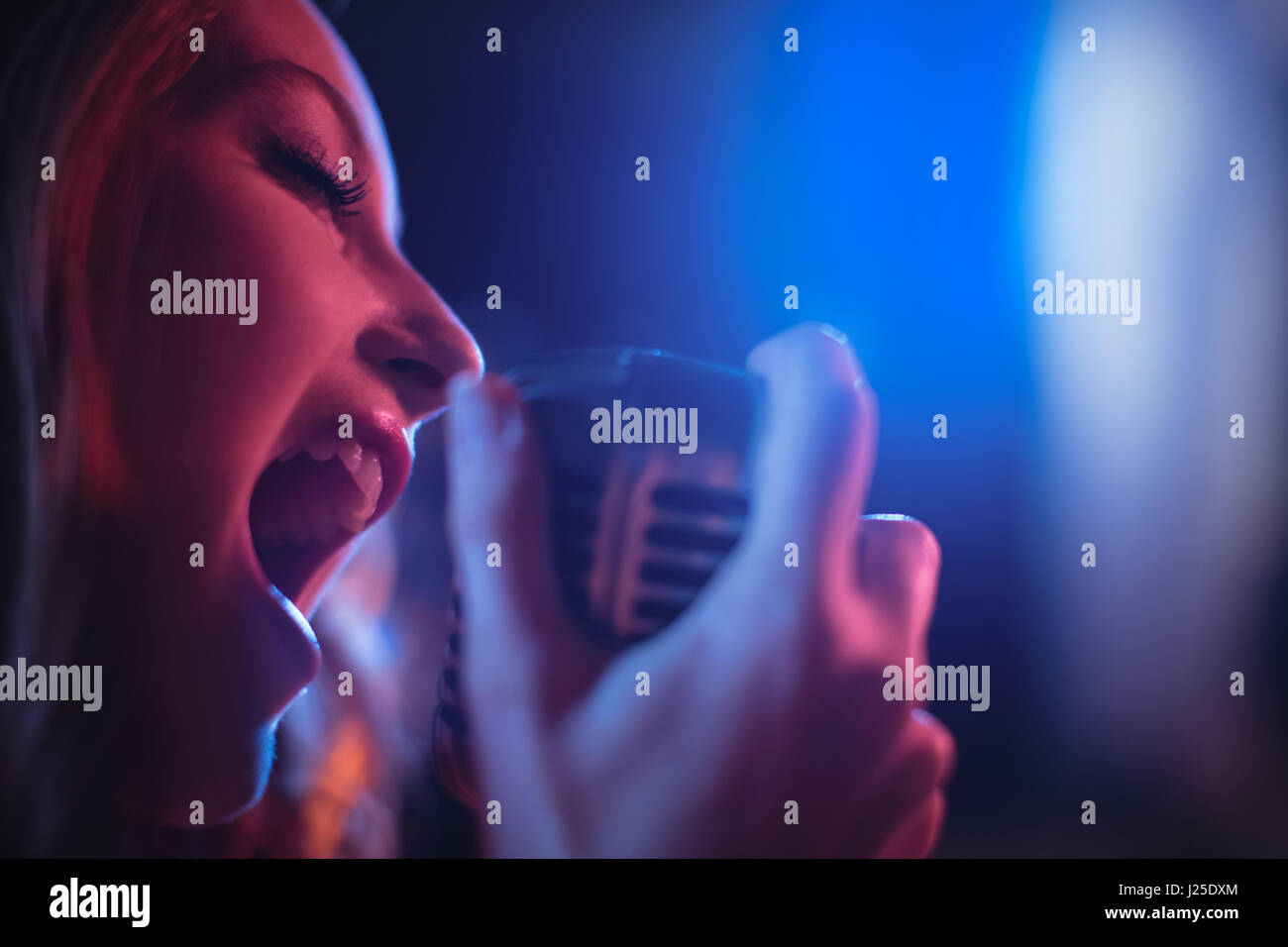 Female singing keyboard hi-res stock photography and images - Alamy