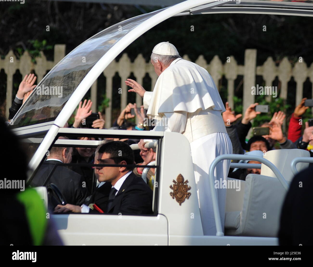 Pope Francis arrives in Milan for a one-day visit. The Pope passes ...