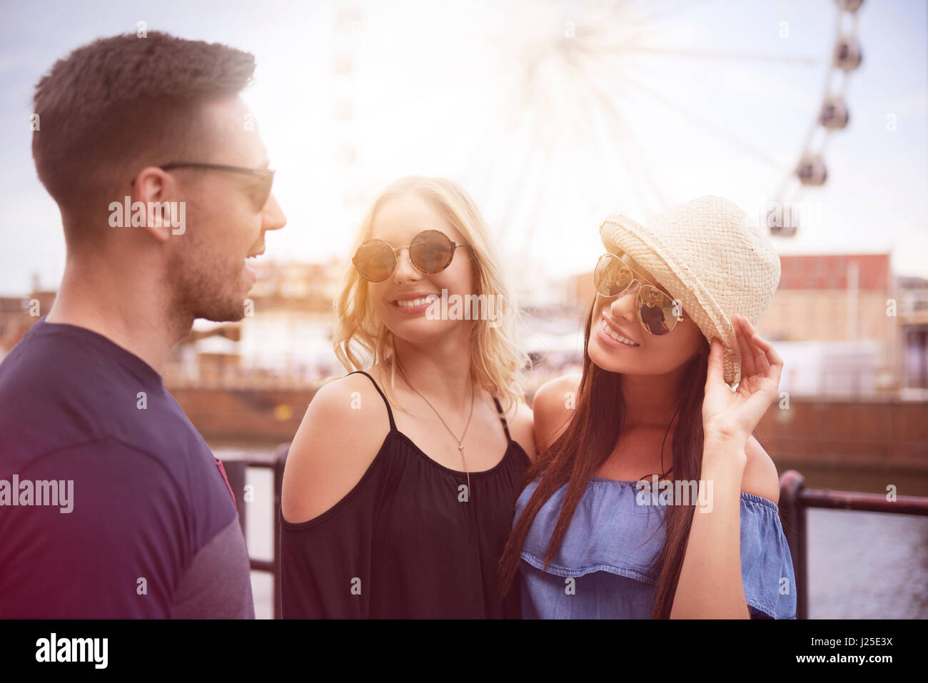 Having a chat with friends Stock Photo - Alamy