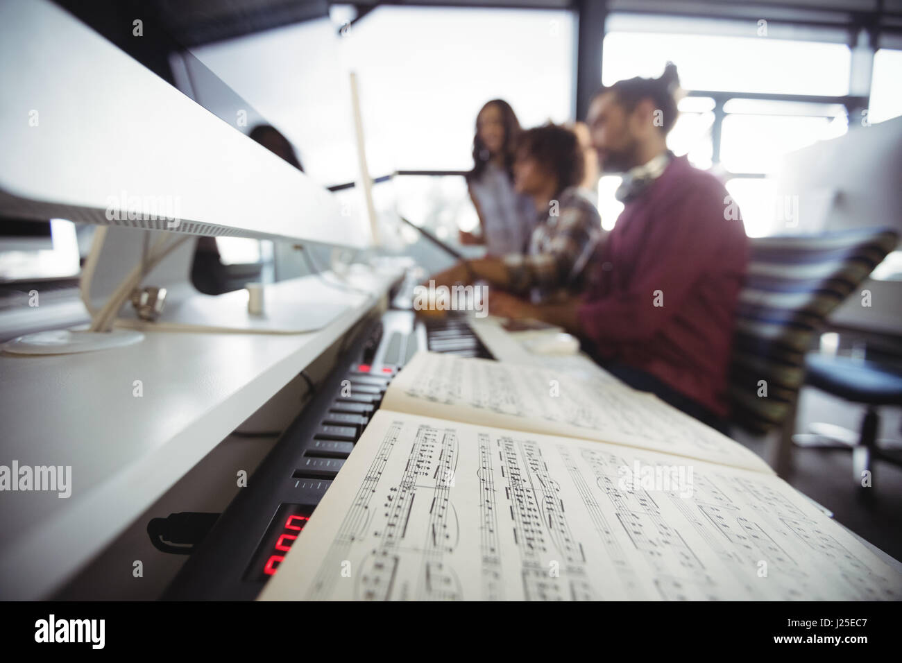 Three sound engineers working together Stock Photo - Alamy
