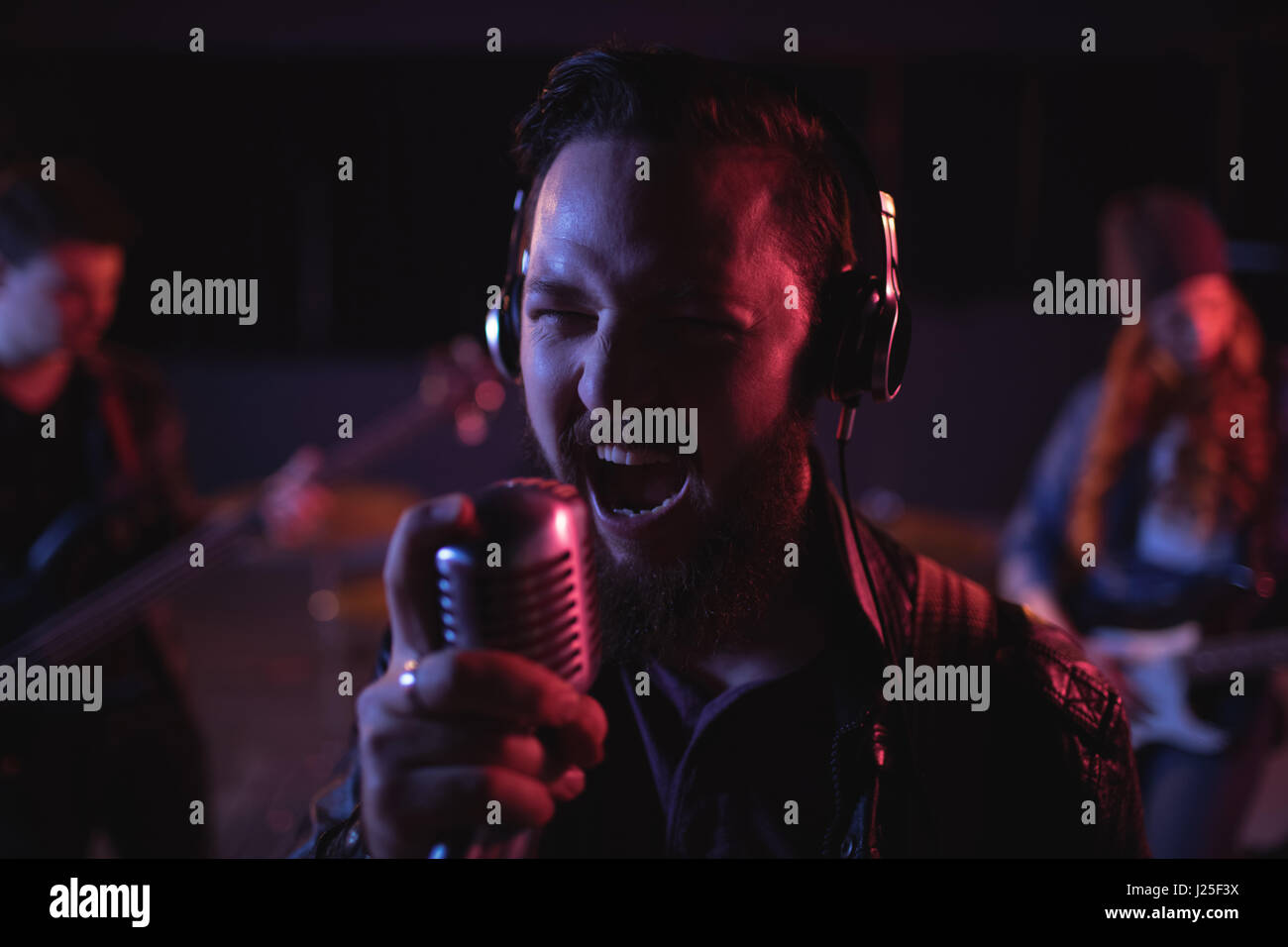 Man singing in recording studio hi-res stock photography and images - Alamy
