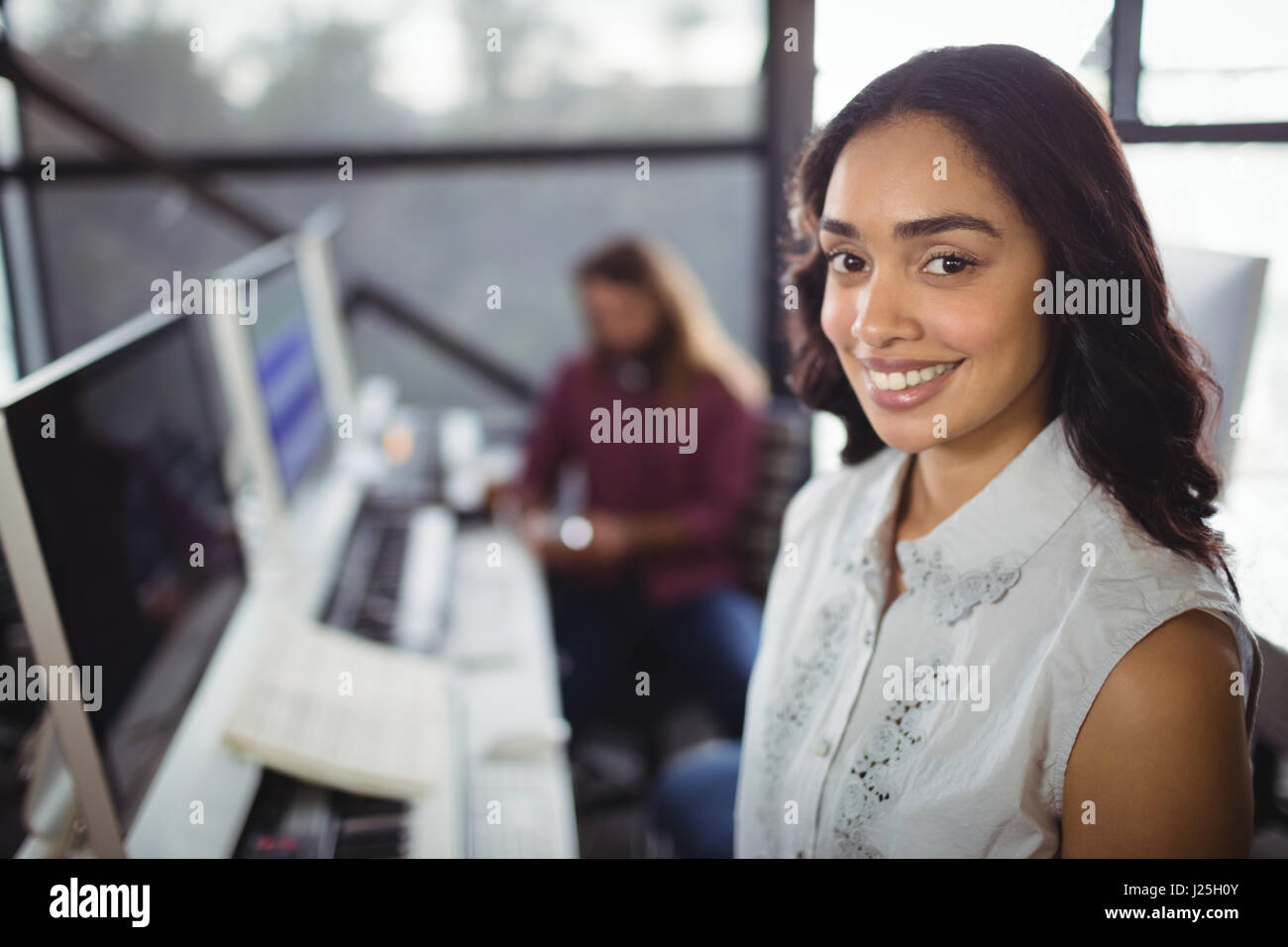 Portrait of beautiful female sound engineer in studio Stock Photo - Alamy