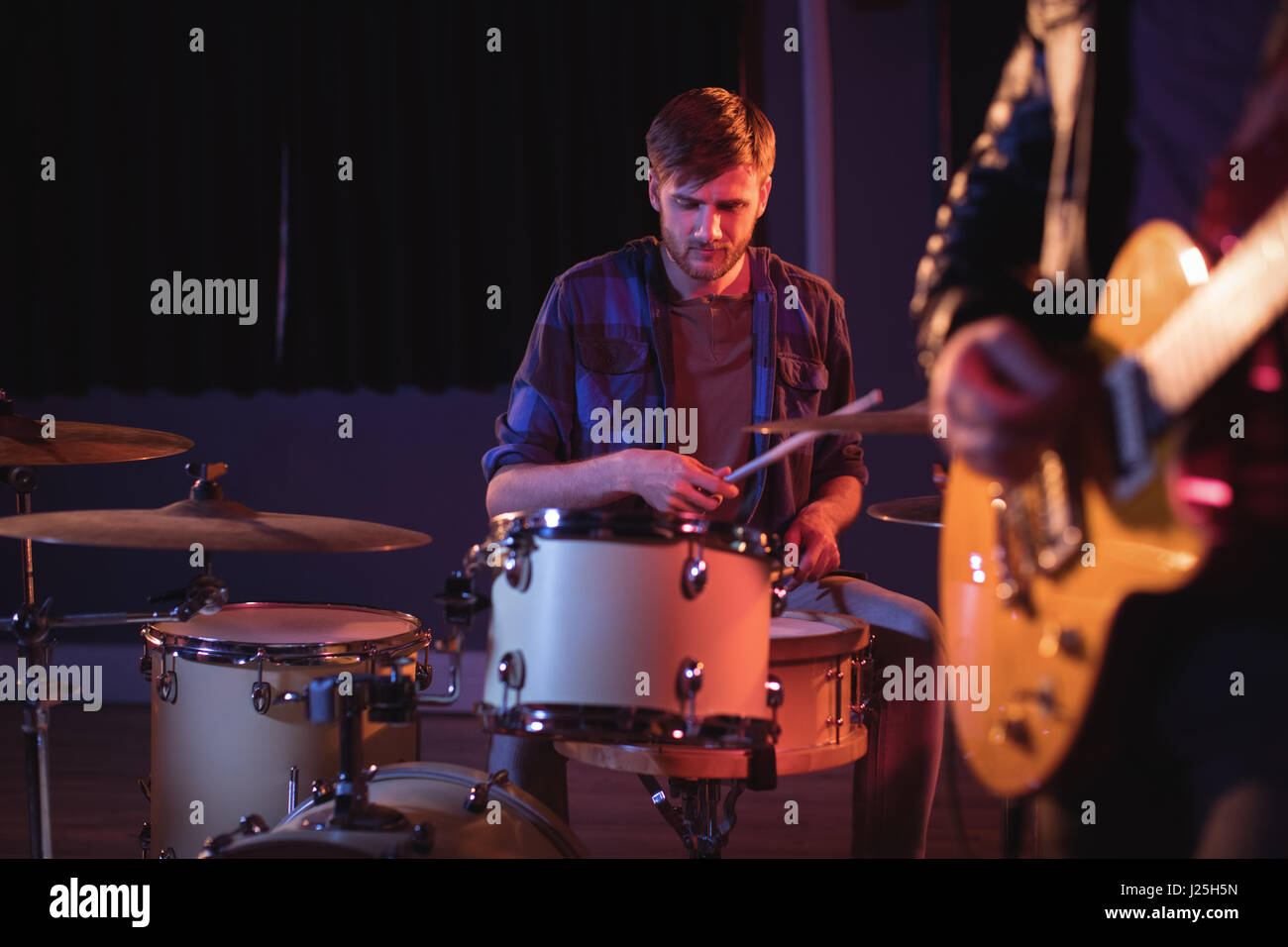 Drummer playing drums hi-res stock photography and images - Alamy