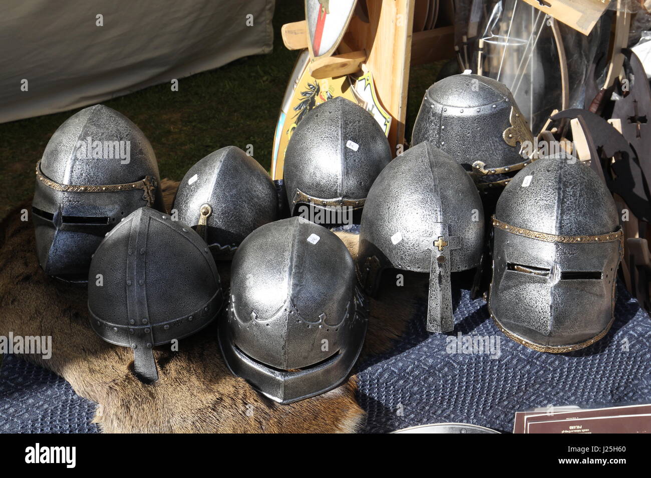 People in costume and items for sale at a medieval fair Stock Photo - Alamy
